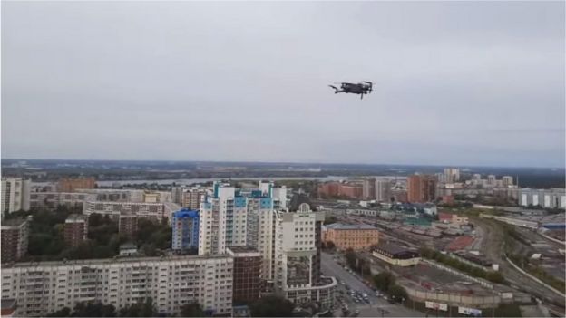 Russian activist saves data from police with drone - BBC News