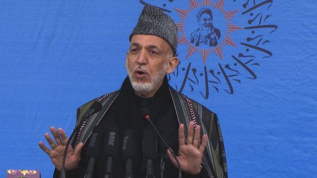 Former Afghan presidents mark anniversary of Taliban rule - BBC News