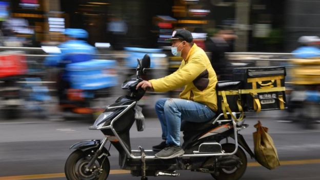 China steps in to regulate brutal '996' work culture - BBC News