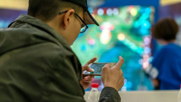 Police bust 'world's biggest' video-game-cheat operation - BBC News
