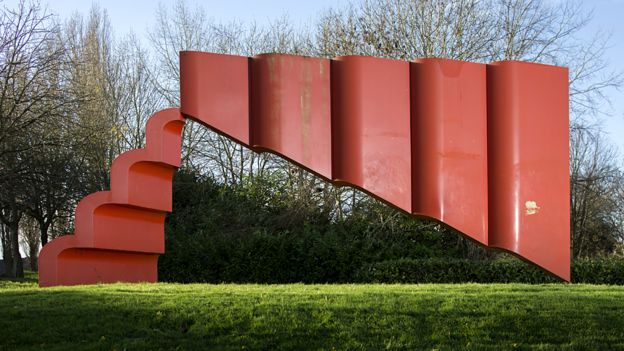 The bright red work of art (and 40 others) now protected - BBC News
