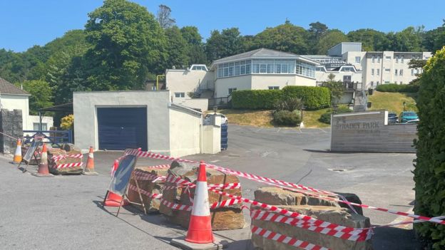 Asylum hotel: Llanelli Stradey Park protest safety fear - BBC News