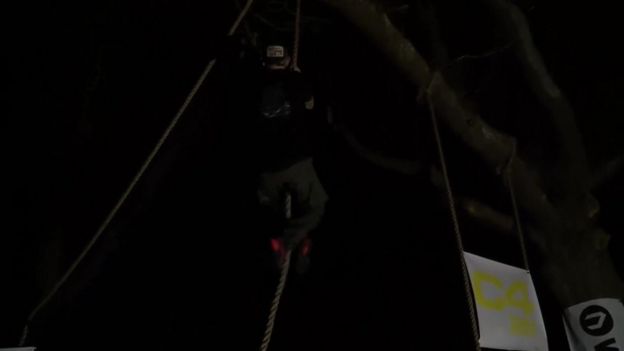 Former commando completes 24-hour charity rope climb - BBC News