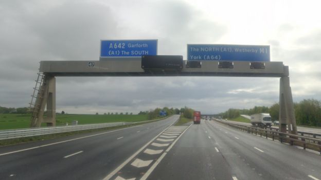 M1 crash: Woman dies as HGV and camper van collide near Garforth - BBC News