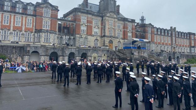 Families at Royal Britannia Naval College passing-out parade - BBC News