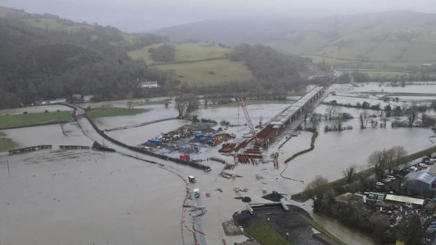Wales weather: Machynlleth bridge closed as cars rescued from floods ...