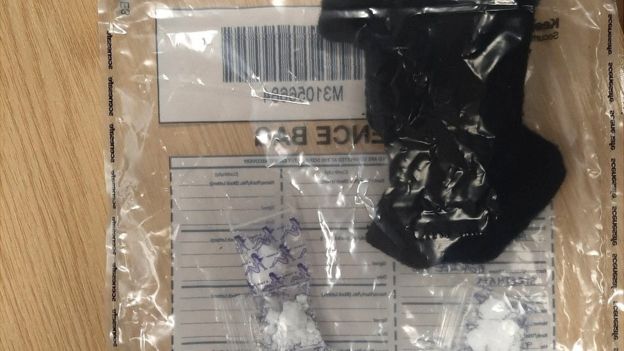 Sock thrown out of Cambridgeshire car leads to drug arrest - BBC News