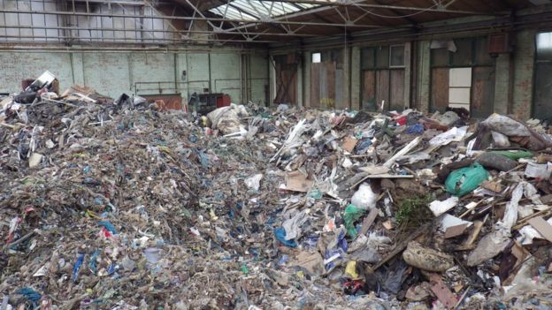 Recycling firm boss jailed for dumping waste in factory - BBC News