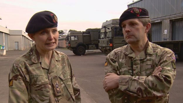 Wife hands military command to husband - BBC News