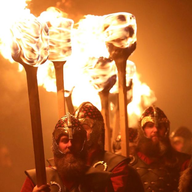 In pictures: Up Helly Aa Viking fire festival lights up Shetland - BBC News