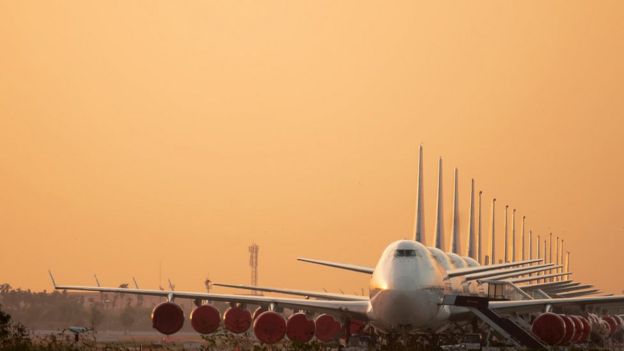 Climate change: World aviation agrees 'aspirational' net zero plan ...