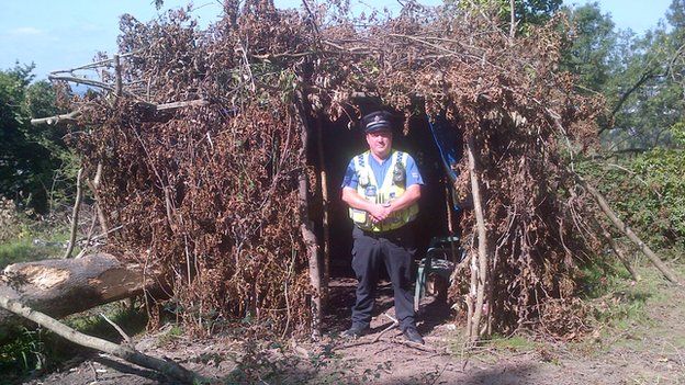 Bridgend drugs den found under camouflage in woods - BBC News