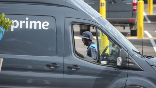 Amazon 'illegally retaliated' against climate activists - BBC News