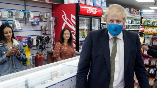 Coronavirus: Donald Trump wears face mask for the first time - BBC News