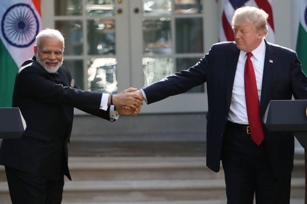 Modi's enthusiastic bear hug beats Trump's handshake - BBC News