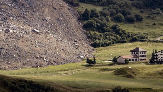 Massive Swiss rockfall stops short of evacuated village of Brienz - BBC ...