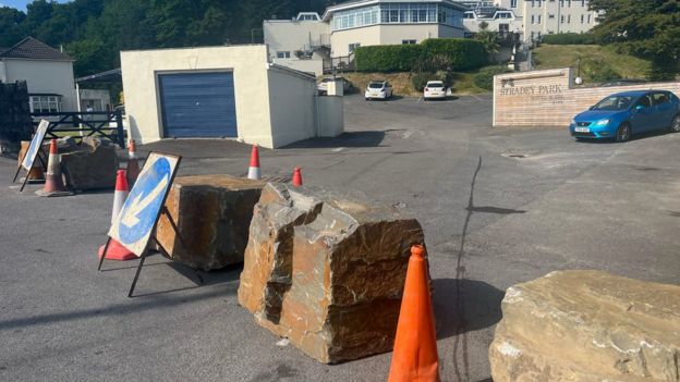 Asylum hotel: Llanelli Stradey Park protest safety fear - BBC News