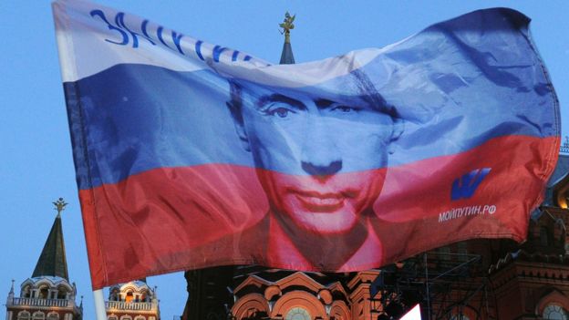 Russia-UK relations: May and Putin pledge to improve ties - BBC News