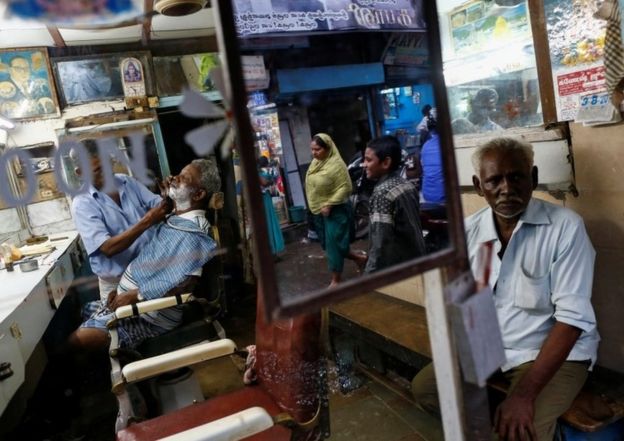 Why the Indian barbershop is a unique institution - BBC News
