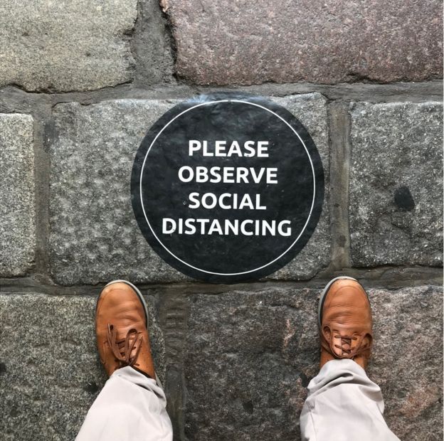 Covid: Those warning signs are being photographed for history - BBC News