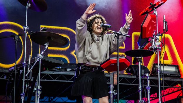Bluedot: Grace Jones shines at rain-hit festival - BBC News