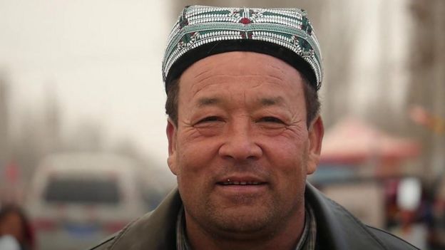 China Uighurs: Xinjiang legalises 're-education' camps - BBC News