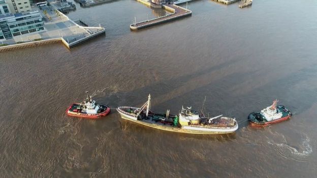 Arctic Corsair: Famous Hull trawler towed to new berth - BBC News