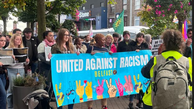 Anti-racism rally after south Belfast attacks - BBC News