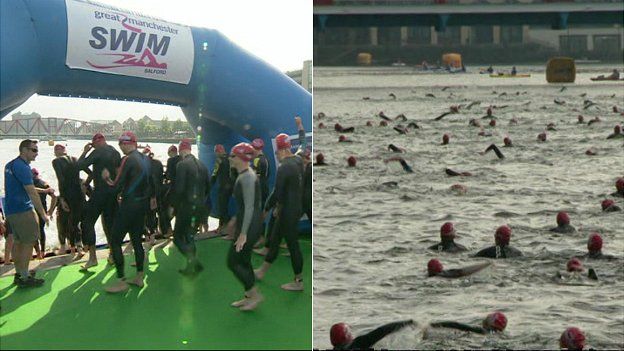 Great Manchester Swim: Thousands take the plunge - BBC News