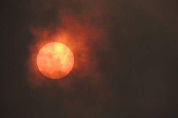 Red sun phenomenon 'caused by Saharan dust', analysis shows - BBC News