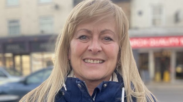 March's 'wonky' Christmas tree lights turned on - BBC News