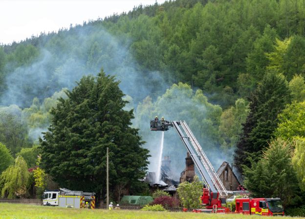 Dozens of firefighters tackle house blaze in Moray - BBC News