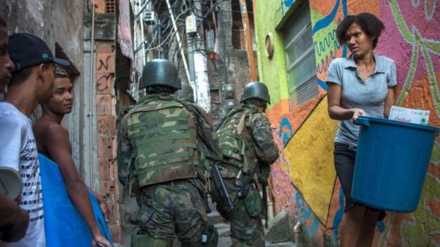 Brazil's army sent to quell Rio favela violence - BBC News