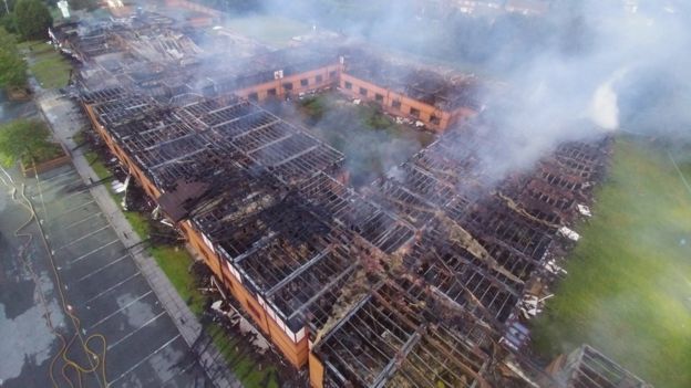 Holiday Inn destroyed by fire 'too dangerous to enter' - BBC News