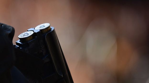 Australian man kills friend while posing with shotgun - BBC News