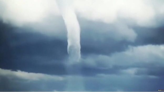 Huge waterspout hits Italy's south-western city - BBC News
