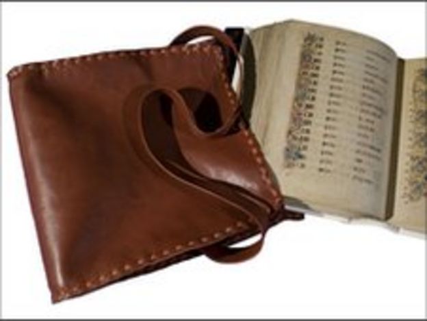 Early book satchels used by monks go on display - BBC News