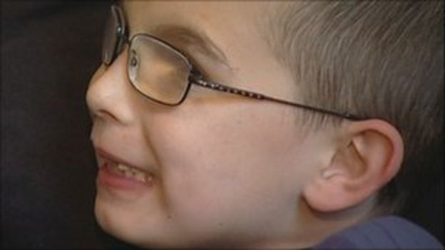 Trapped boy 'freed by neighbours' in Old Trafford - BBC News