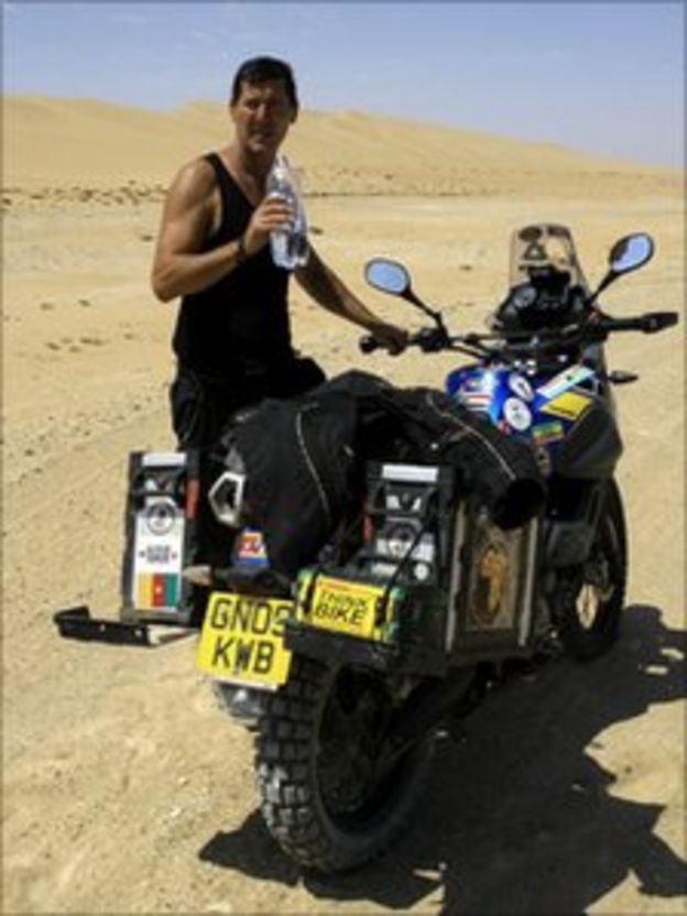 Kent biker completes solo journey around Africa - BBC News