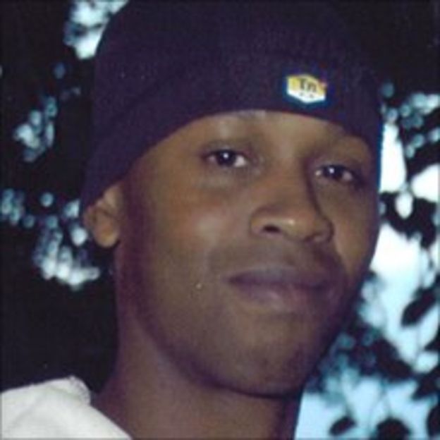 Murder inquiry into unit shooting as body identified - BBC News