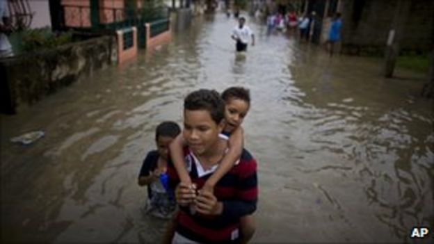 Venezuela floods kill at least 21 after heavy rains - BBC News