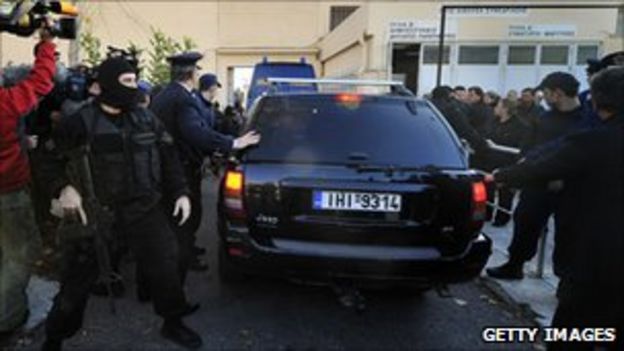 Greece bombs: Nine suspected anarchists in Athens trial - BBC News