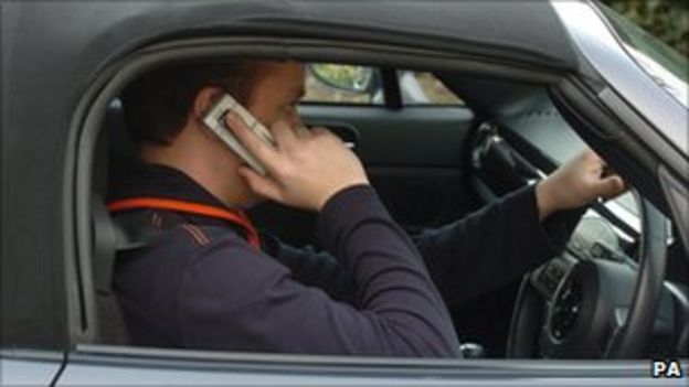 Van man caught using laptop while driving in Dumfries - BBC News