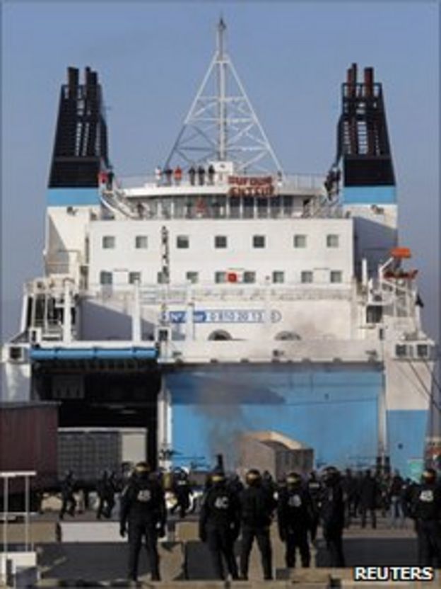 French riot police break up ferry strike in Marseille - BBC News