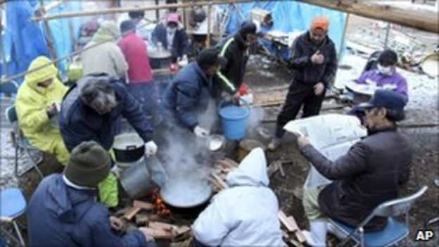 Community spirit shines through in Japan's dark times - BBC News