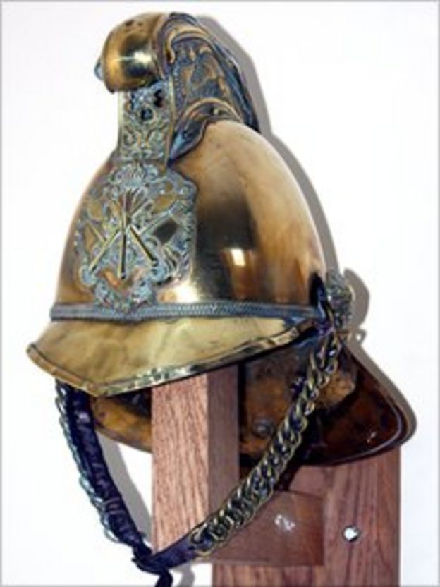 Cirencester return for 120-year-old brass fire helmet - BBC News