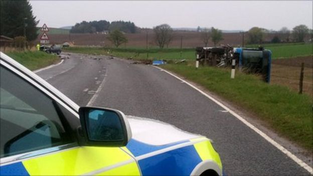 One airlifted after bus and car accident on A947 - BBC News