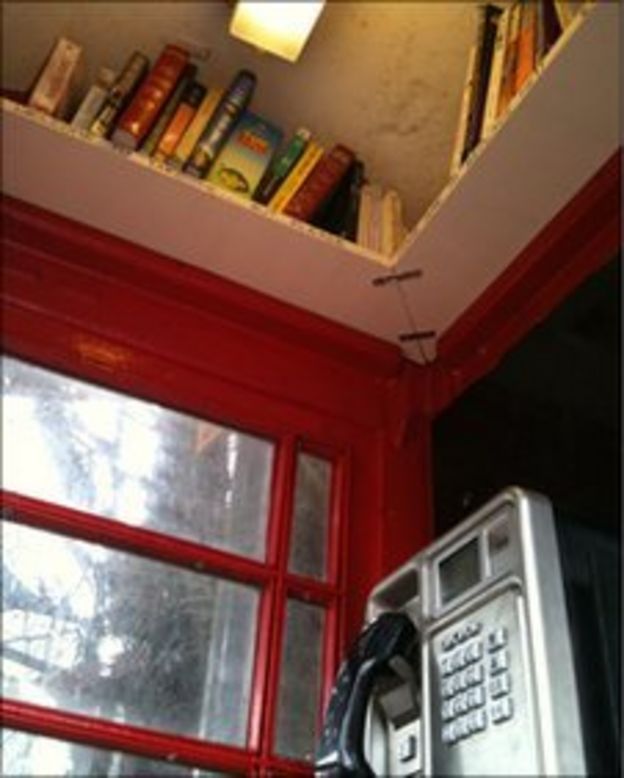 Red phone box in Horsley turned into library - BBC News