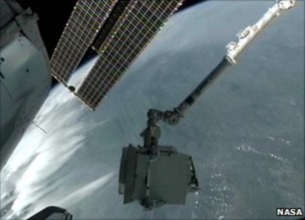 Alpha Magnetic Spectrometer bolted to space station - BBC News