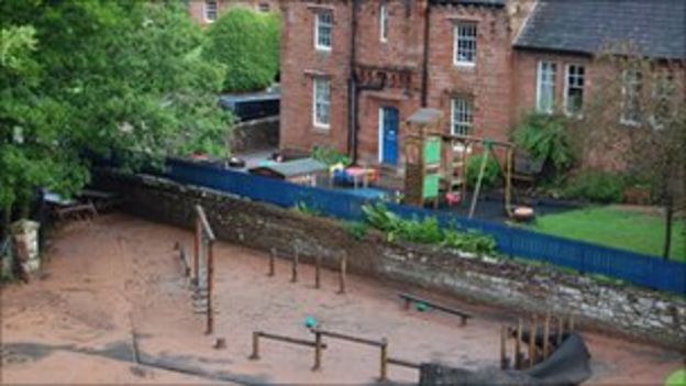 Great Corby hit by flash flooding - BBC News